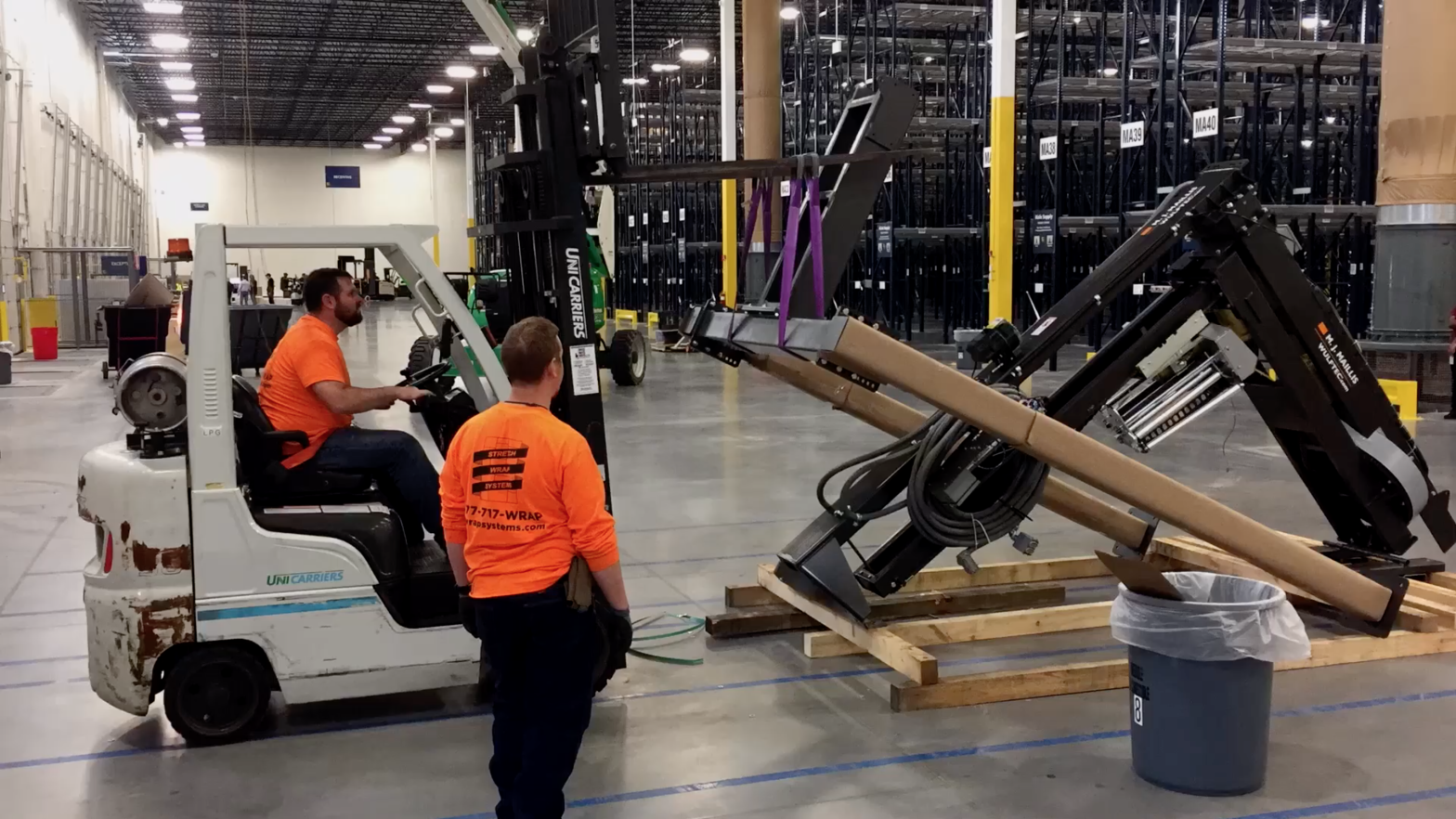 SWS Packaging - Stretch wrappers, strappers, palletizers, conveyors ...